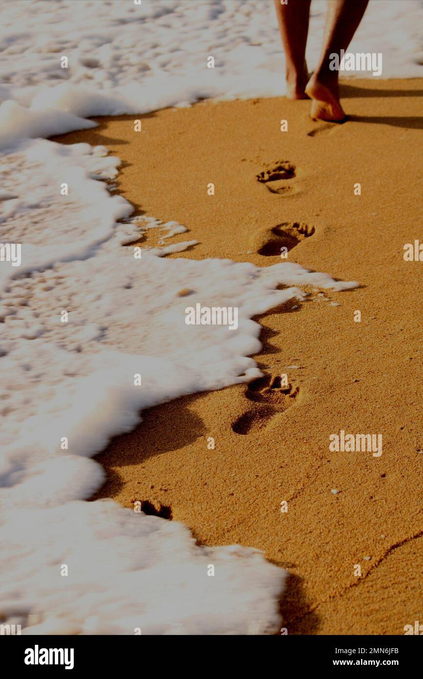 A person walk in the beach Stock Photo - Alamy