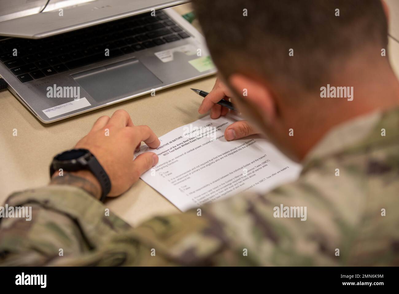 U.S. Soldiers competing in the Army Best Squad Competition take a ...