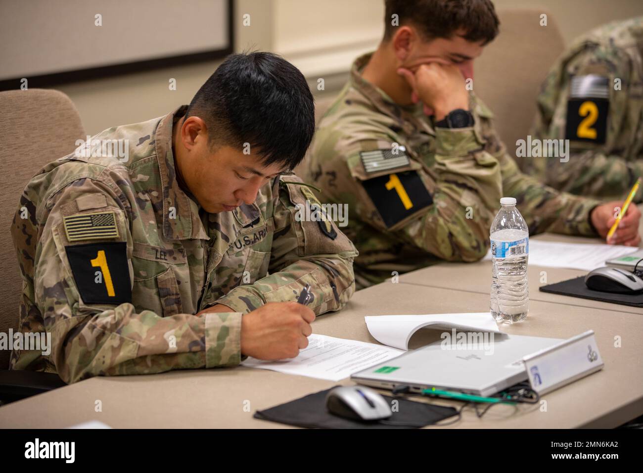 U.S. Soldiers competing in the Army Best Squad Competition take a ...