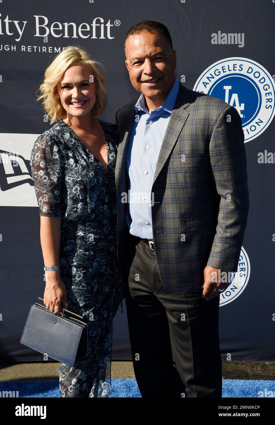 Los Angeles Dodgers manager Dave Roberts and his wife Tricia pose ...