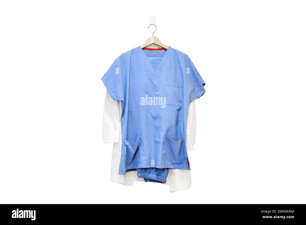 Doctor uniform on a hanger at home, a nurse robe hanging, isolated on a ...