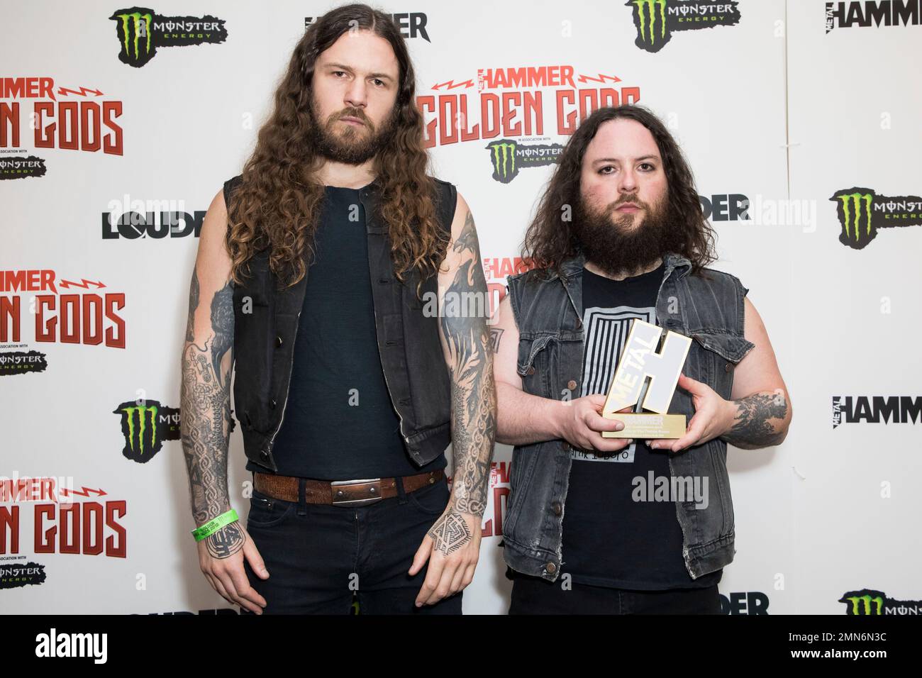 Members of music group Wolves pose for photographers after receiving ...