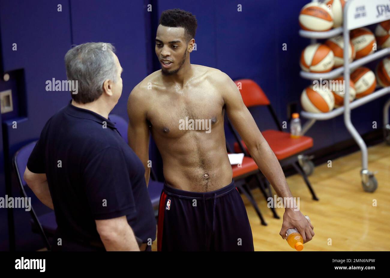 NBA draft prospect Troy Brown Jr., right, from Oregon, talks with ...