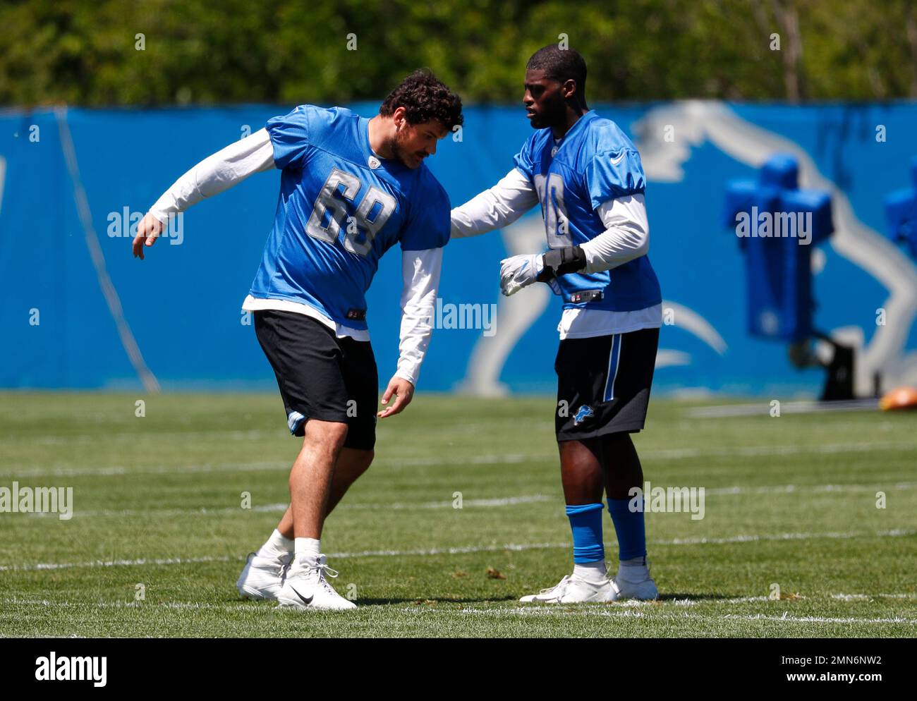 Detroit Lions defensive end Anthony Zettel (69) and linebacker Jarrad ...