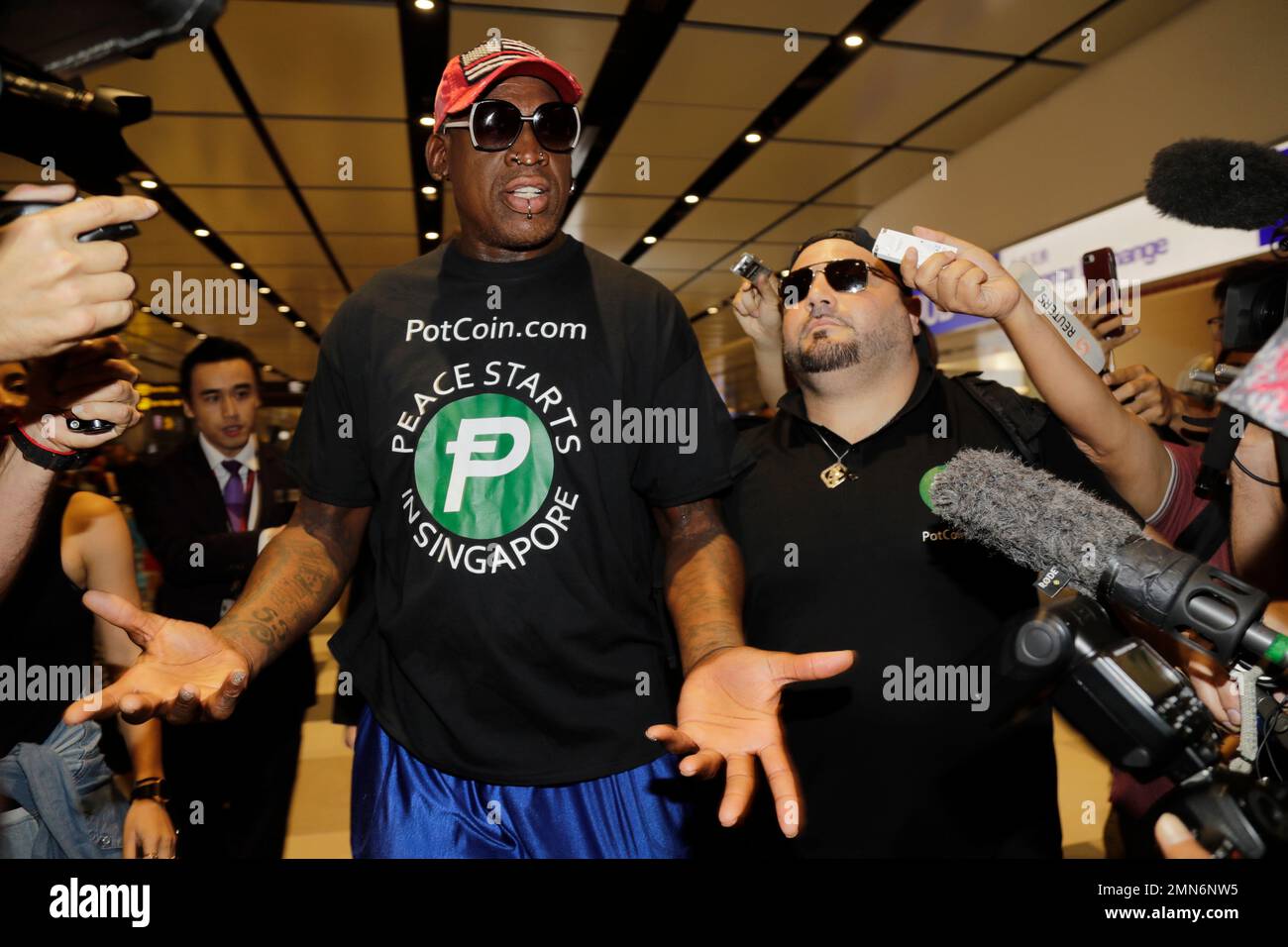 Former NBA basketball player Dennis Rodman, and Chris Volo, right ...