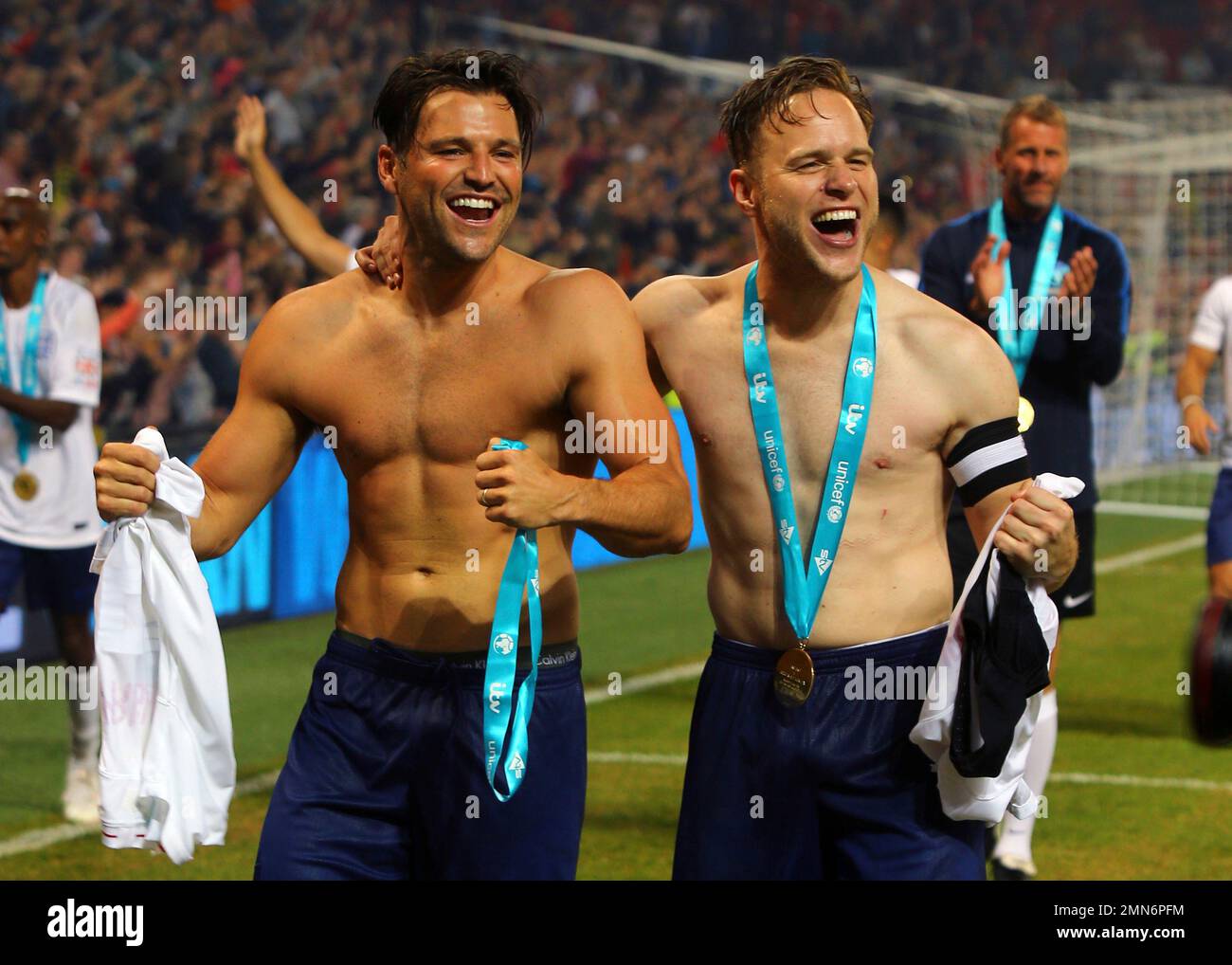 Tv and radio presenter Mark Wright and singer Olly Murs, right ...