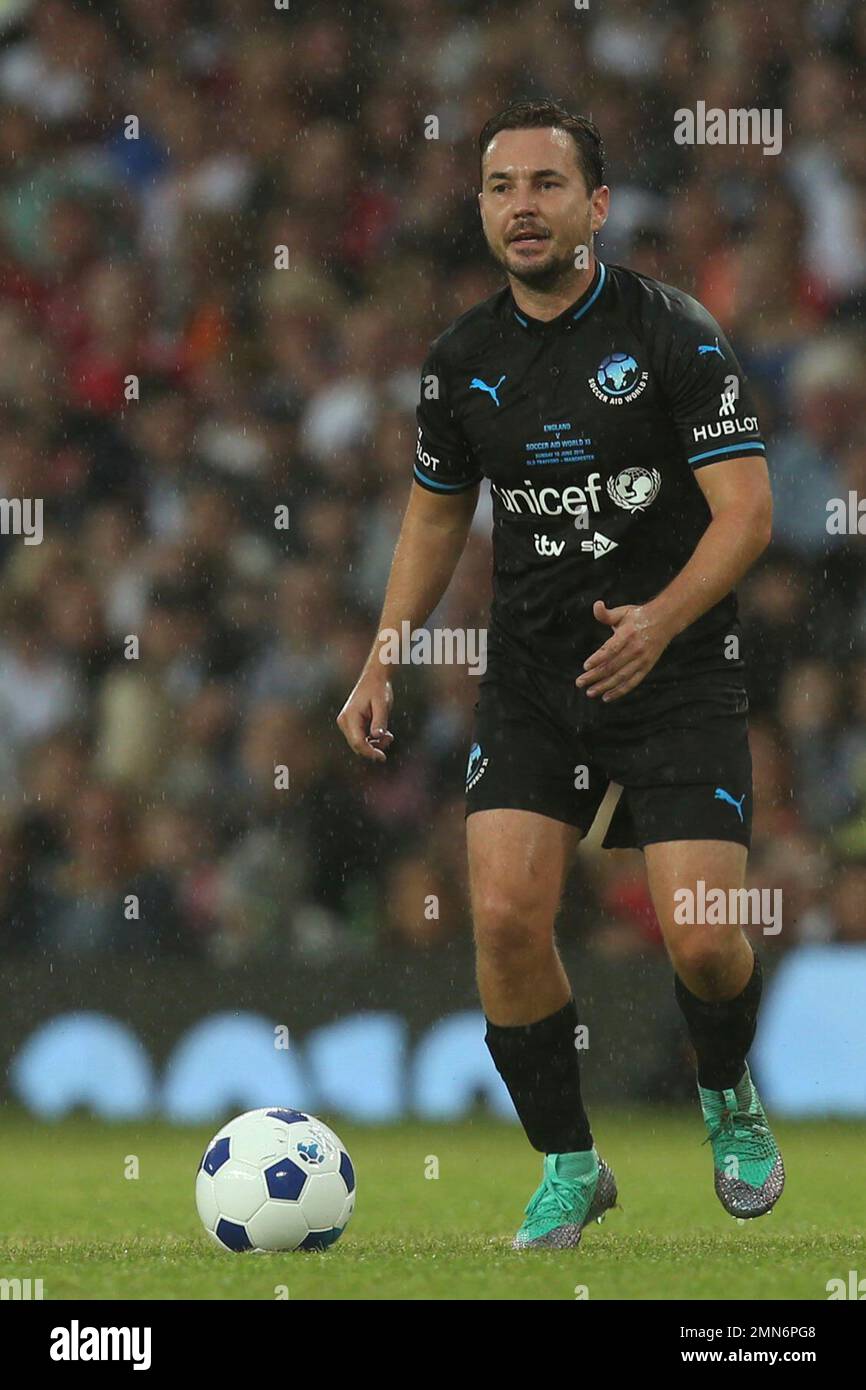 Actor Martin Compston in action on the pitch at Old Trafford as part of ...