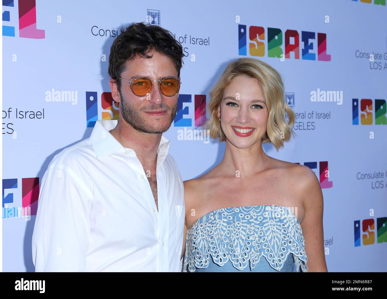 Michael Aloni, left, and Yael Groblas arrive at the Israeli Consulate ...