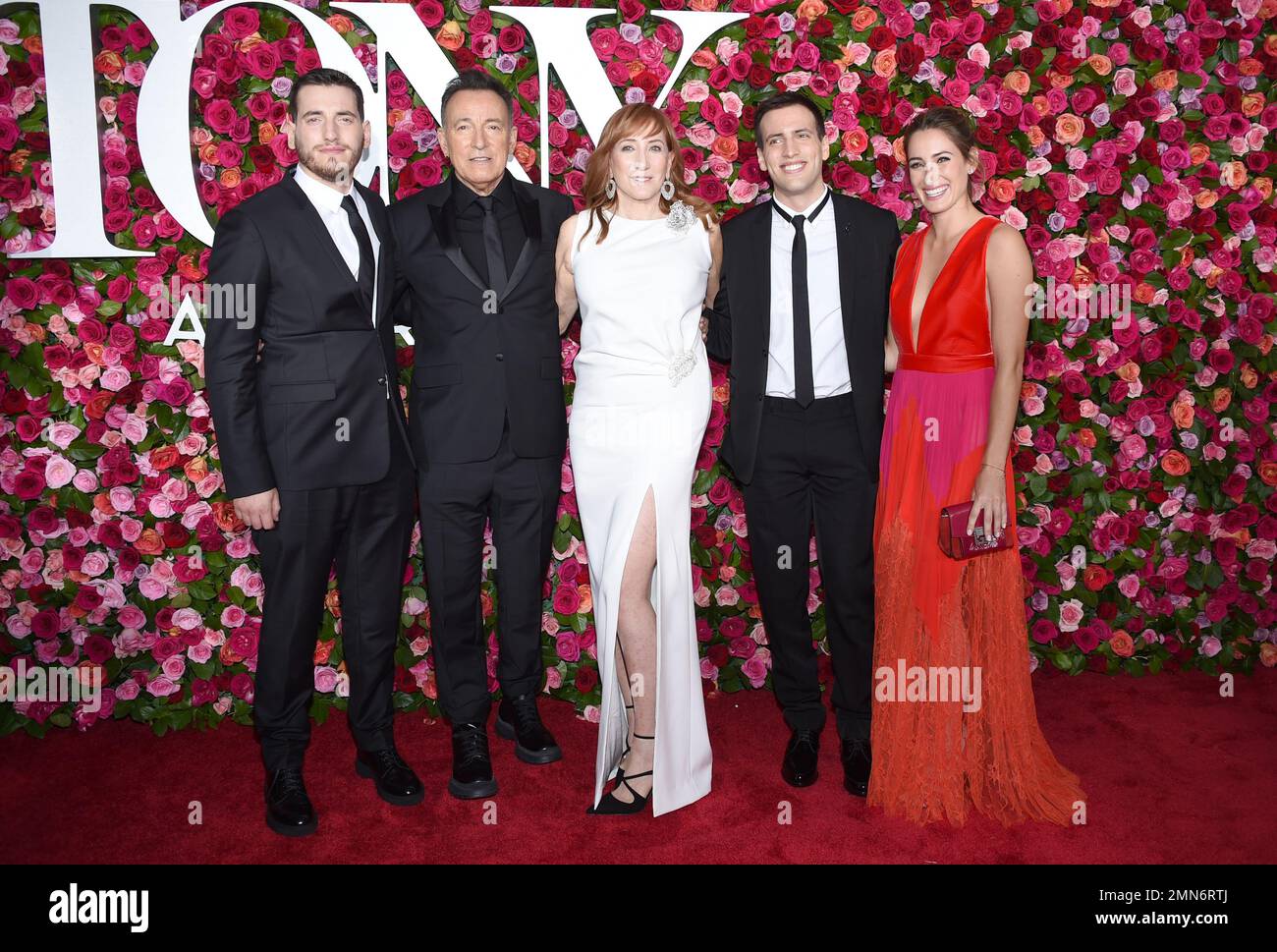 Bruce Springsteen, second left, Patti Scialfa, third right, and their ...