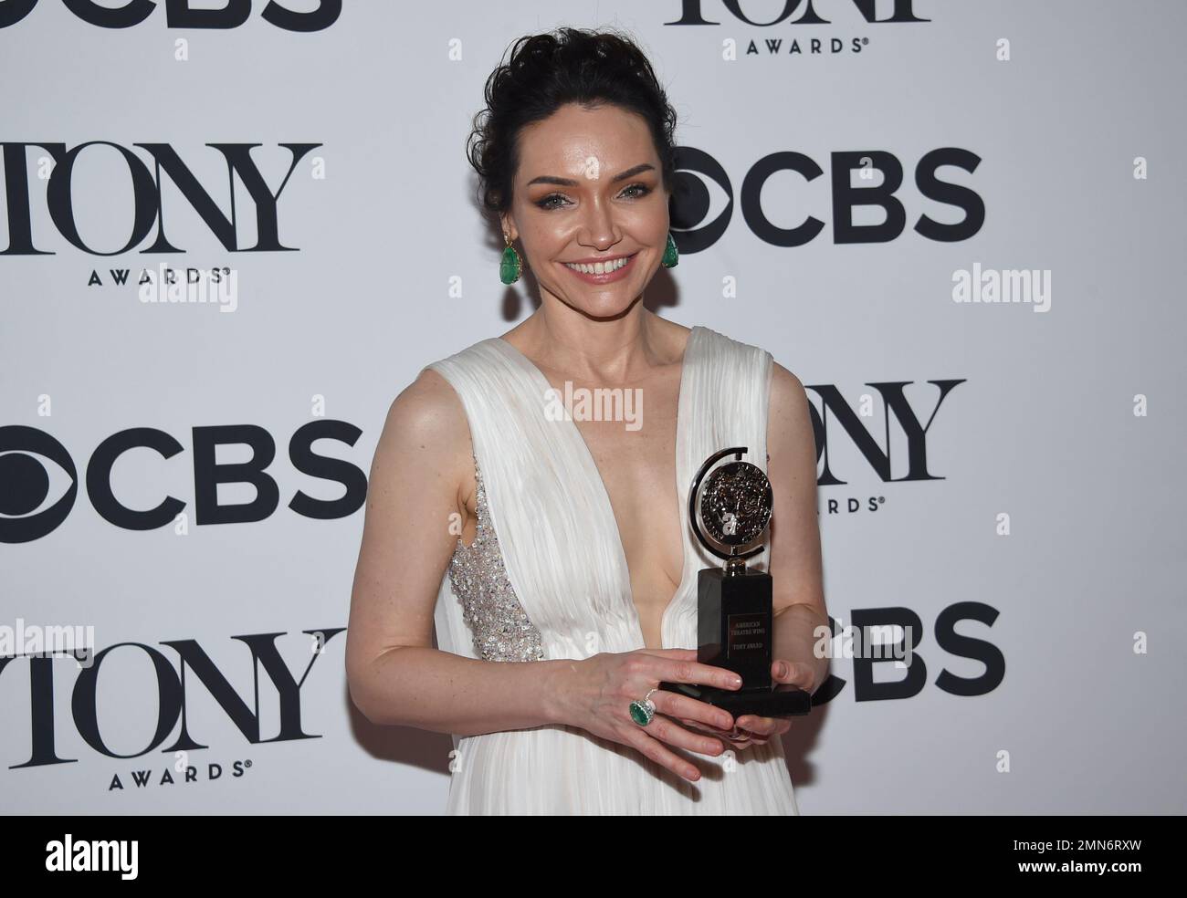 Katrina Lenk poses in the press room with the award for leading actress ...