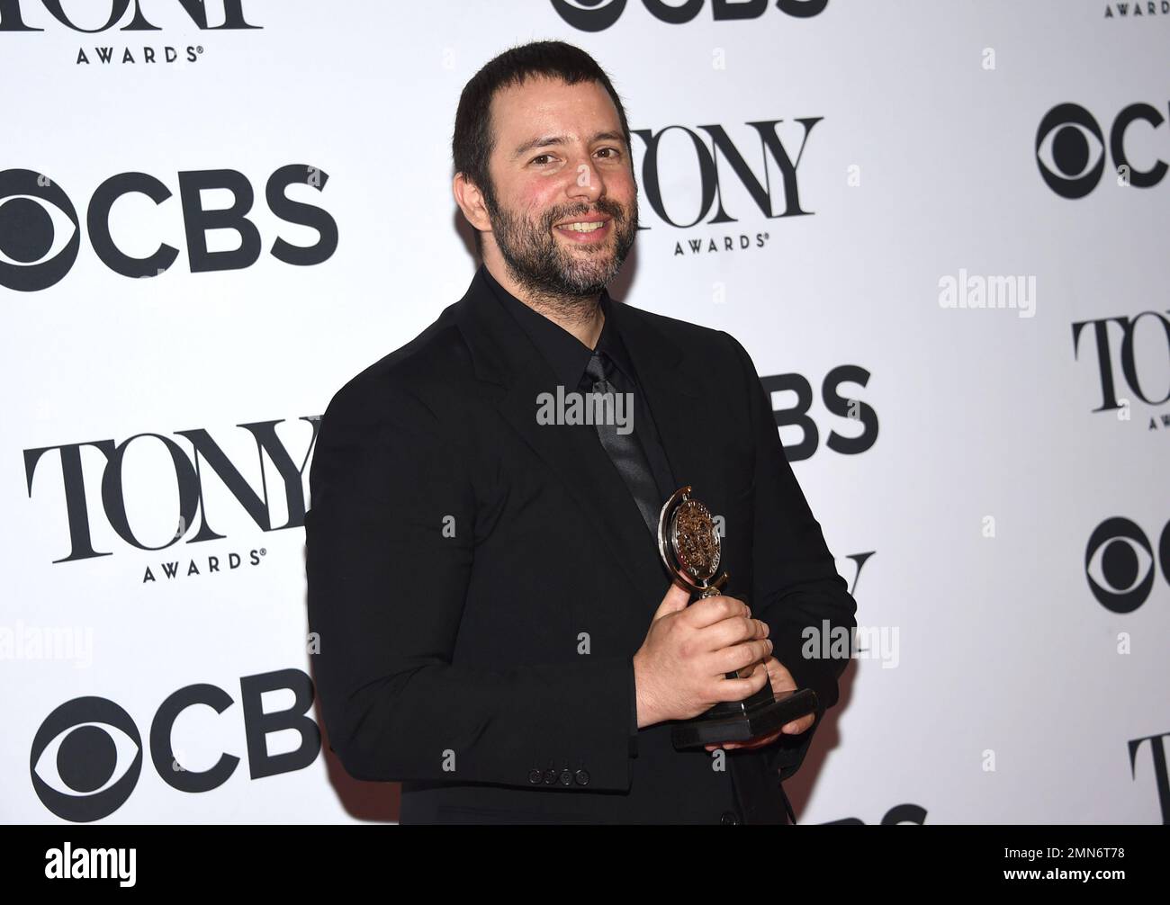 Itamar Moses poses in the press room with the award for book of a ...