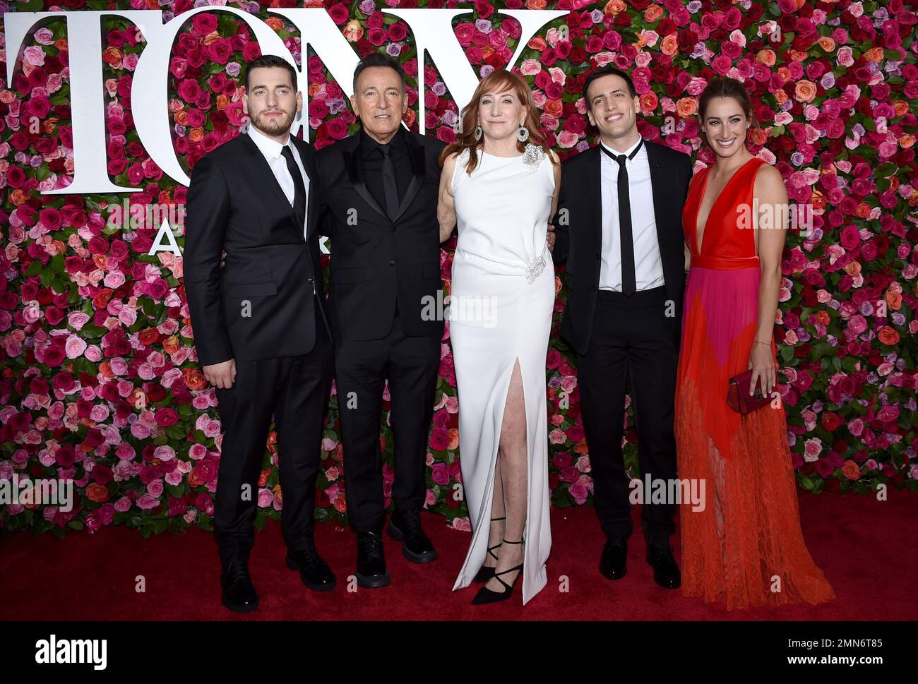 Bruce Springsteen, second left, Patti Scialfa, third right, and their ...