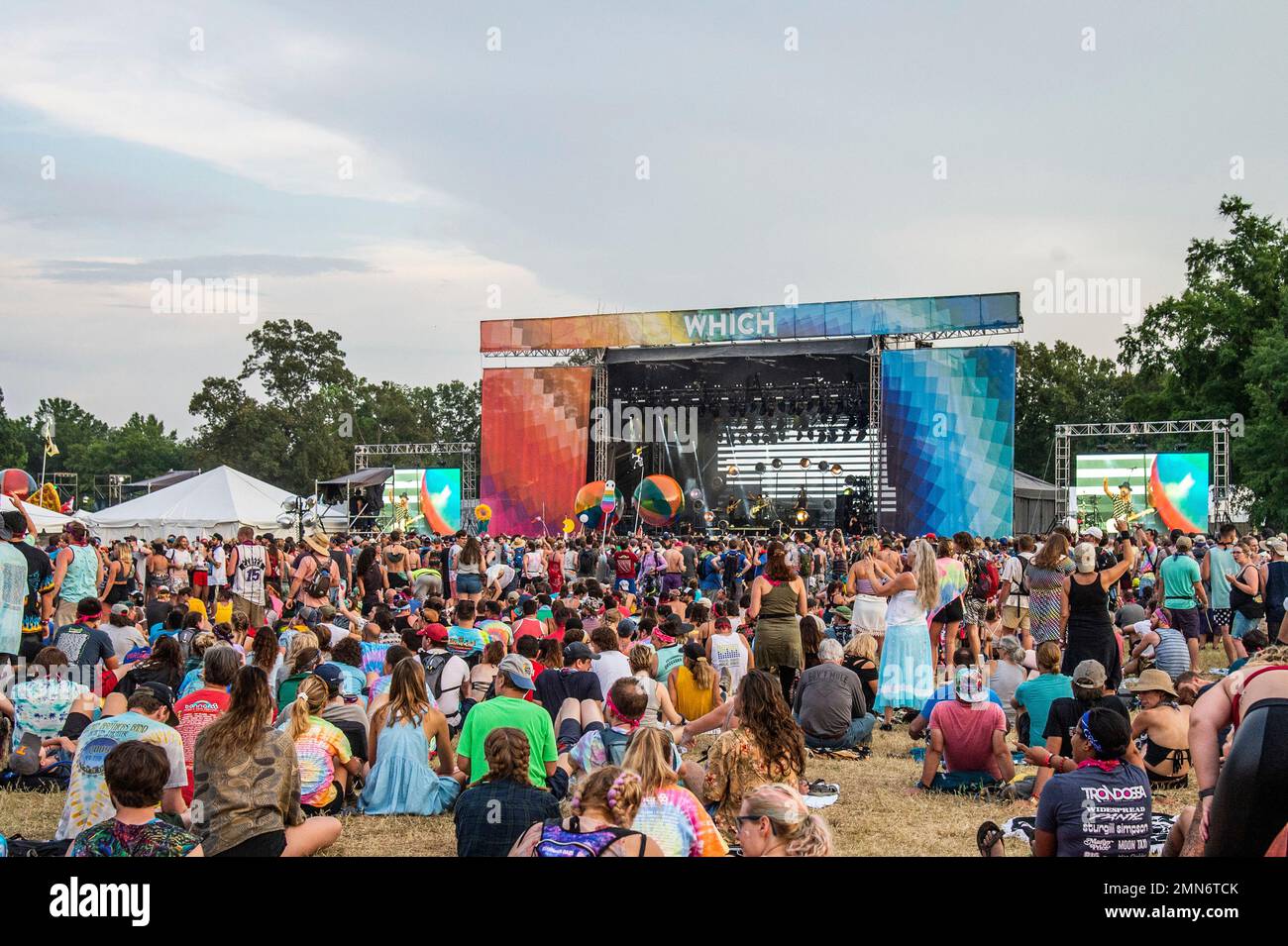 Festival goers attend at the Bonnaroo Music and Arts Festival on Sunday ...