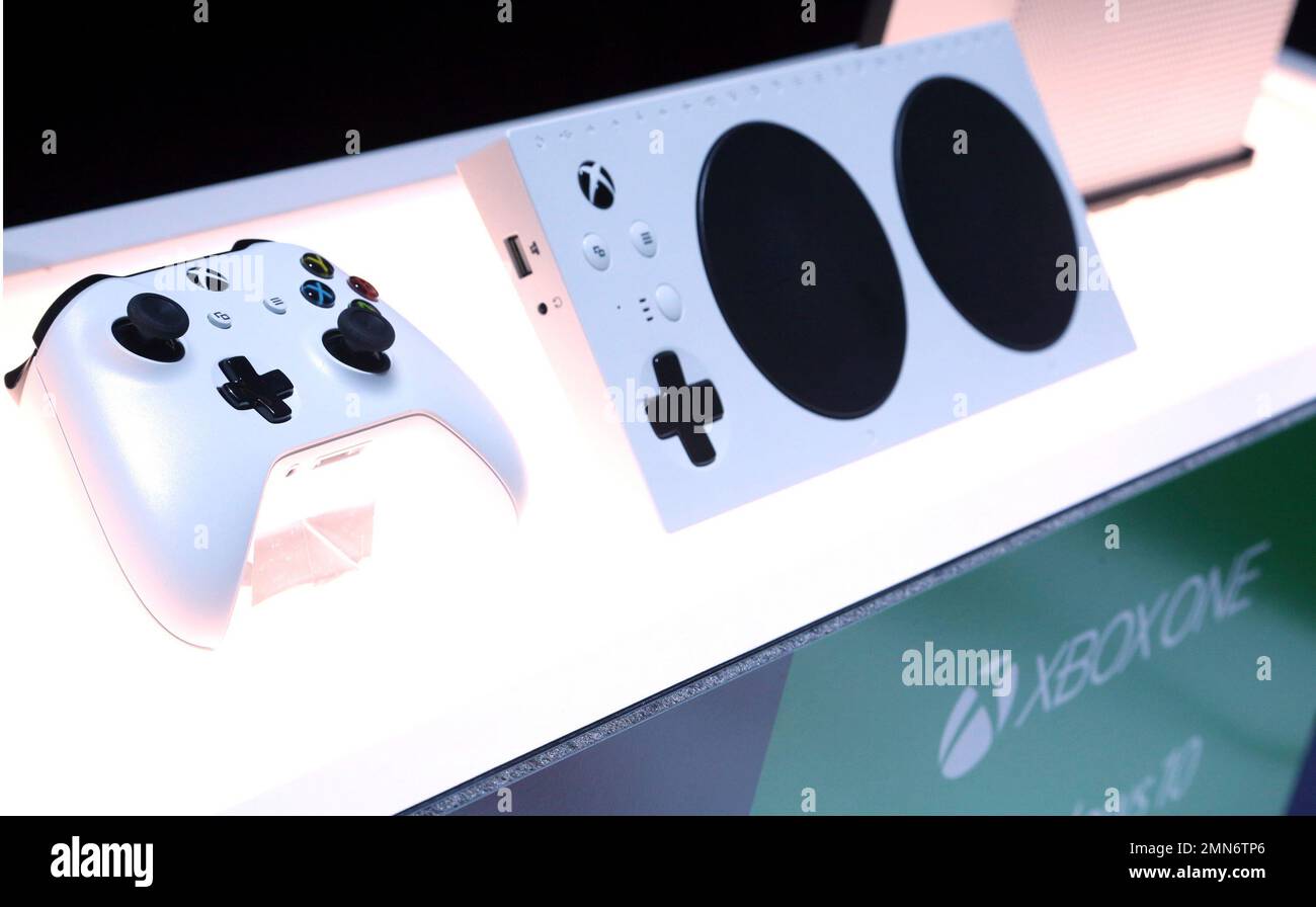 The Xbox Adaptive Controller is on display with a standard Xbox ...