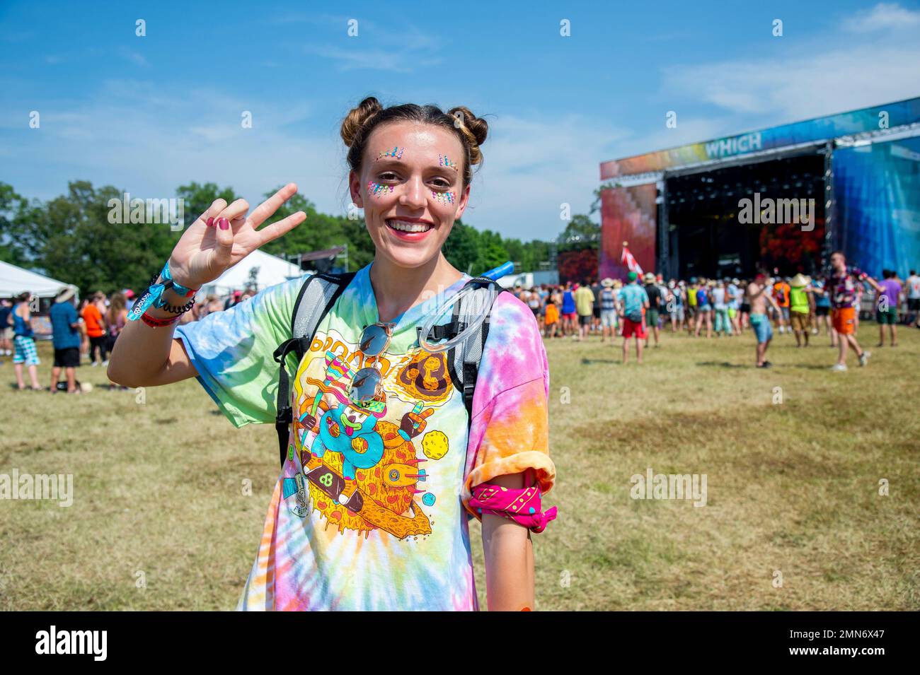 Festival goers attend the Bonnaroo Music and Arts Festival on Sunday ...