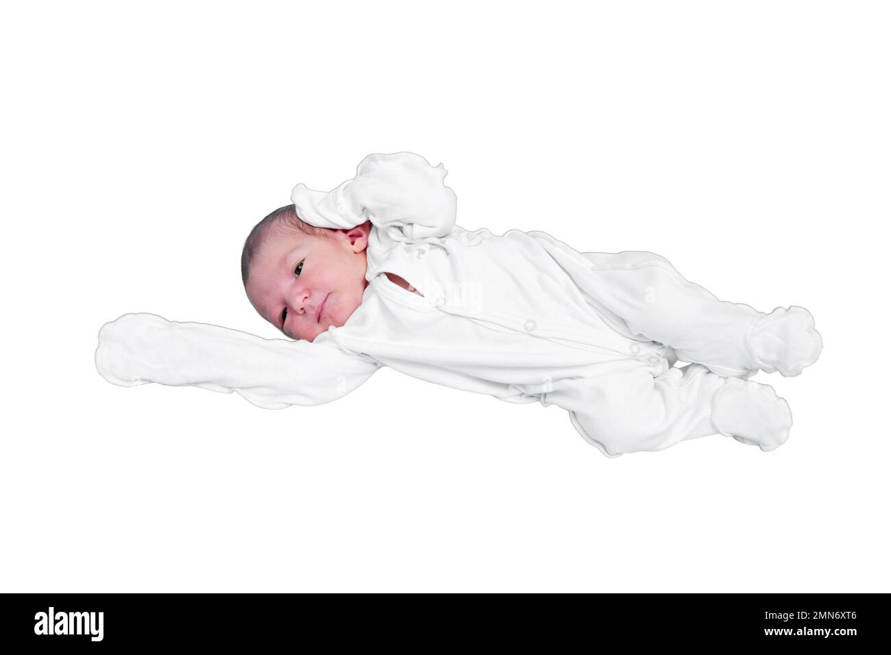 A newborn baby in white clothes, isolated on a white background Stock ...