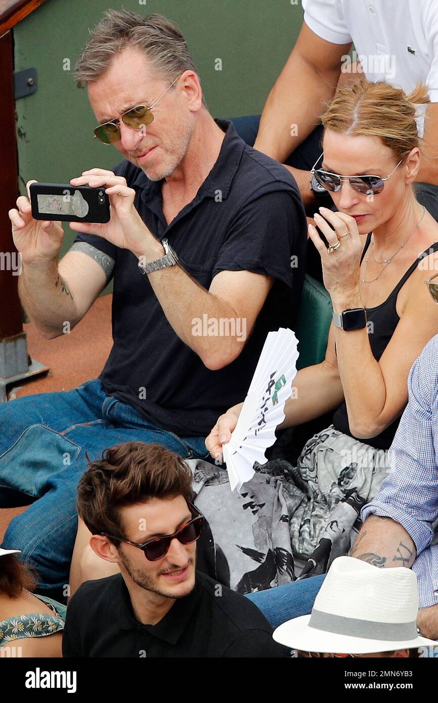 British actor Tim Roth and his wife Nikki Butler watch the men's final ...