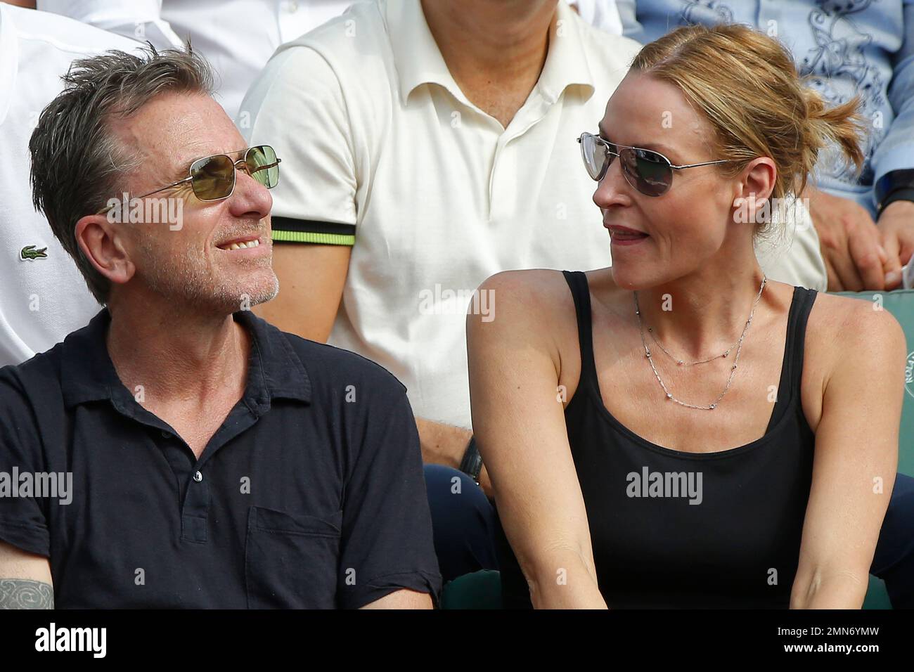 British actor and director Tim Roth and his wife Nikki Butler watch the ...