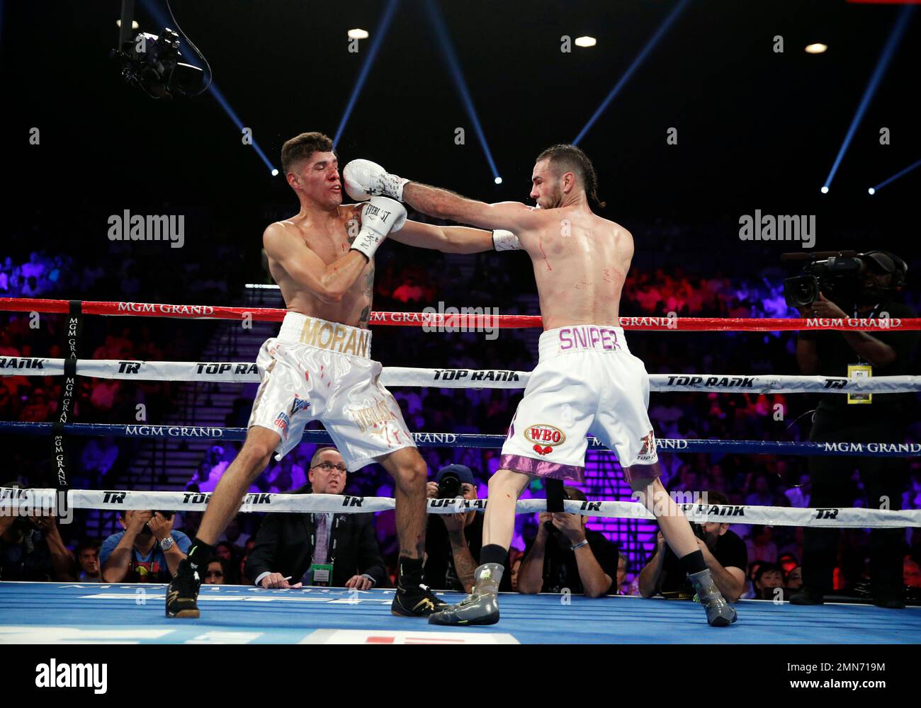 Antonio Moran, left, of Mexico, fights Jose Pedraza, of Puerto Rico ...