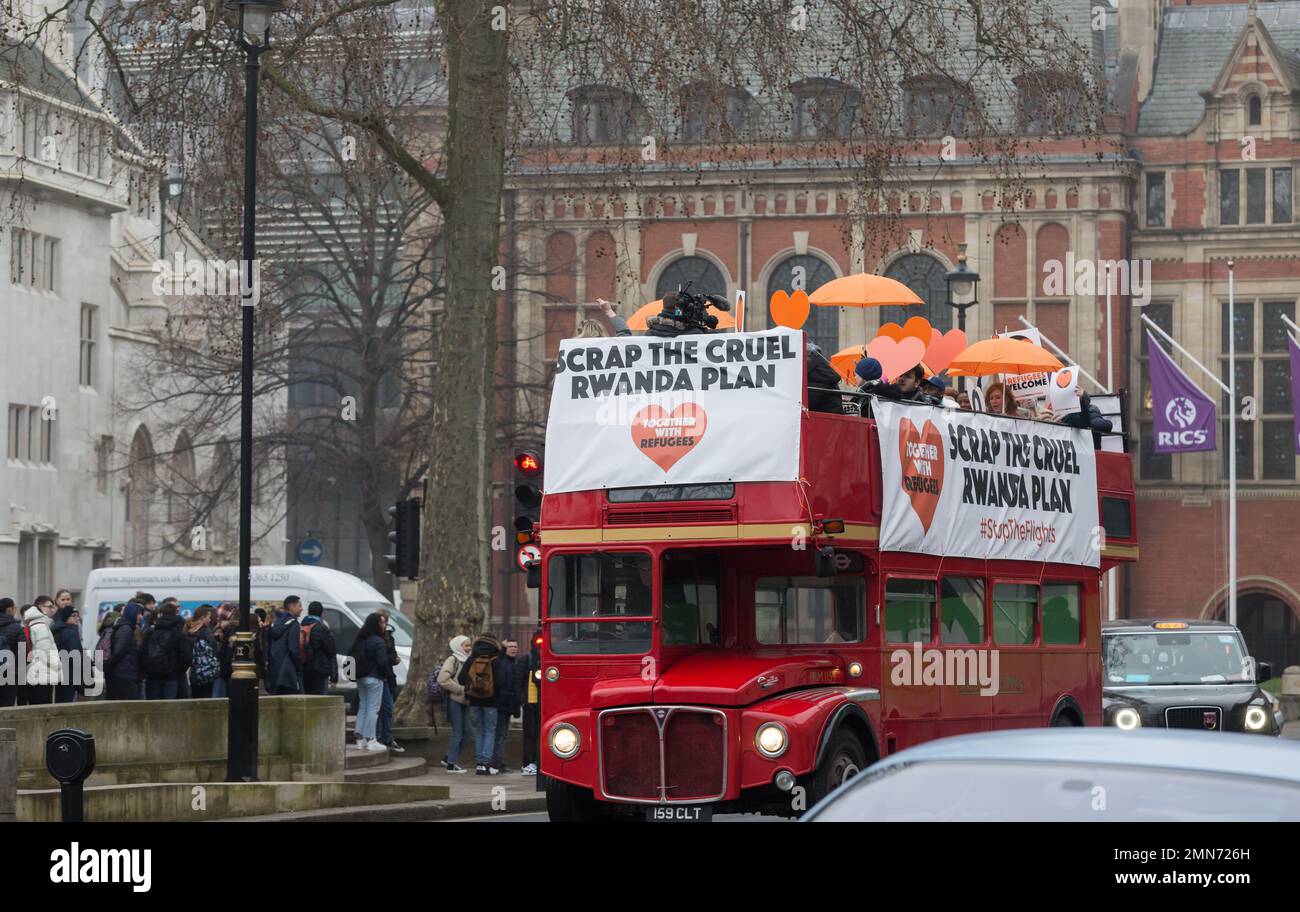 London,UK,25th. jan 2023 Rwanda Flights protest bus driving round ...