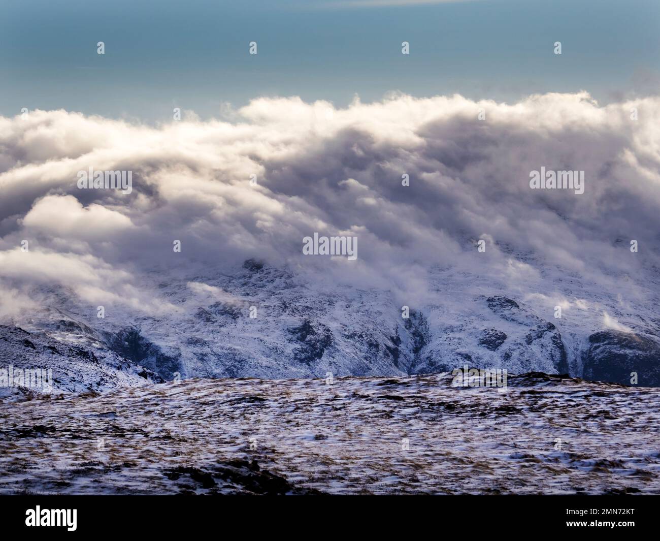 Cloud spilling over Glaramara from Hindscarth in the Lake District, UK ...