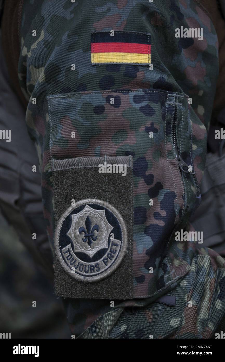 A German soldiers wears the 2nd Cavalry Regiment patch on his shoulder ...