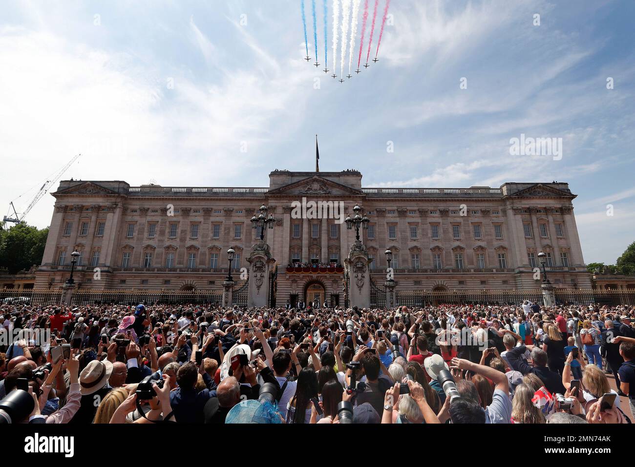 Red Arrows fly over Buckingham Palace to attend the annual Trooping the ...