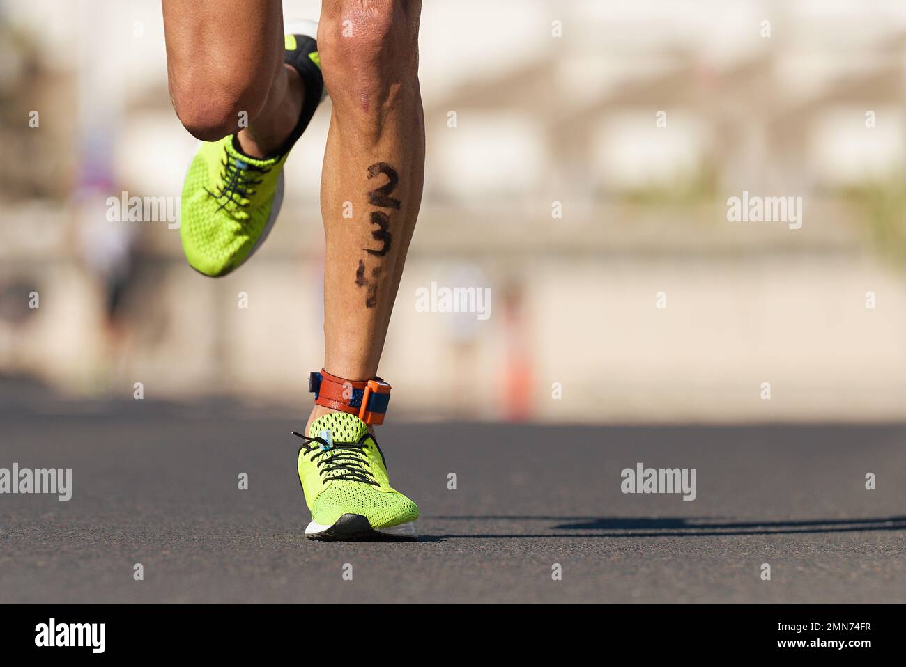 Marathon competition during an ironman the numbers on the leg Stock ...