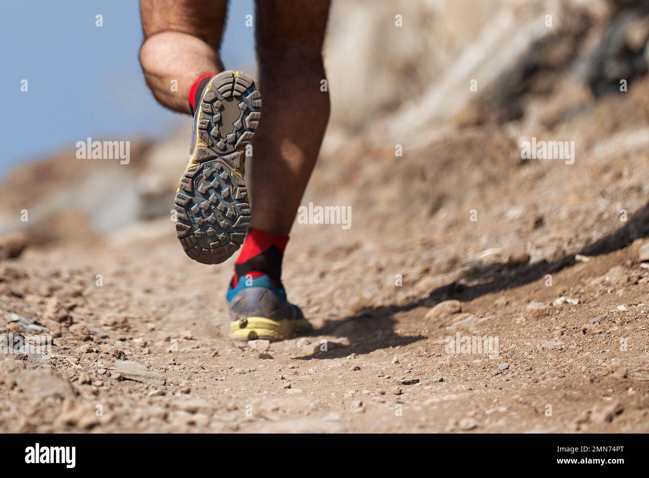Trail running action close up of running shoes in action Stock Photo ...