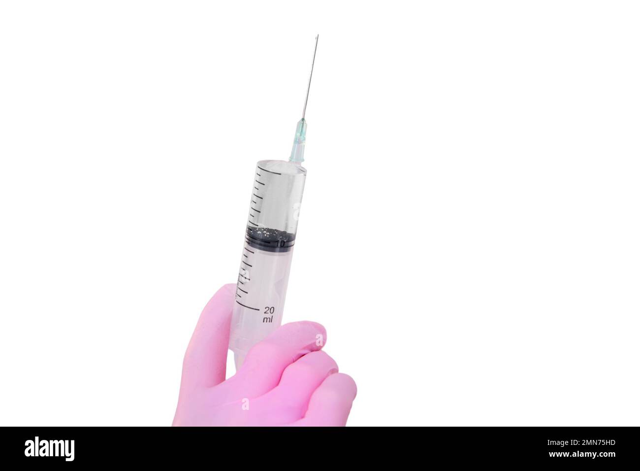 The doctor uses a syringe to inject, isolated on a white background. A ...