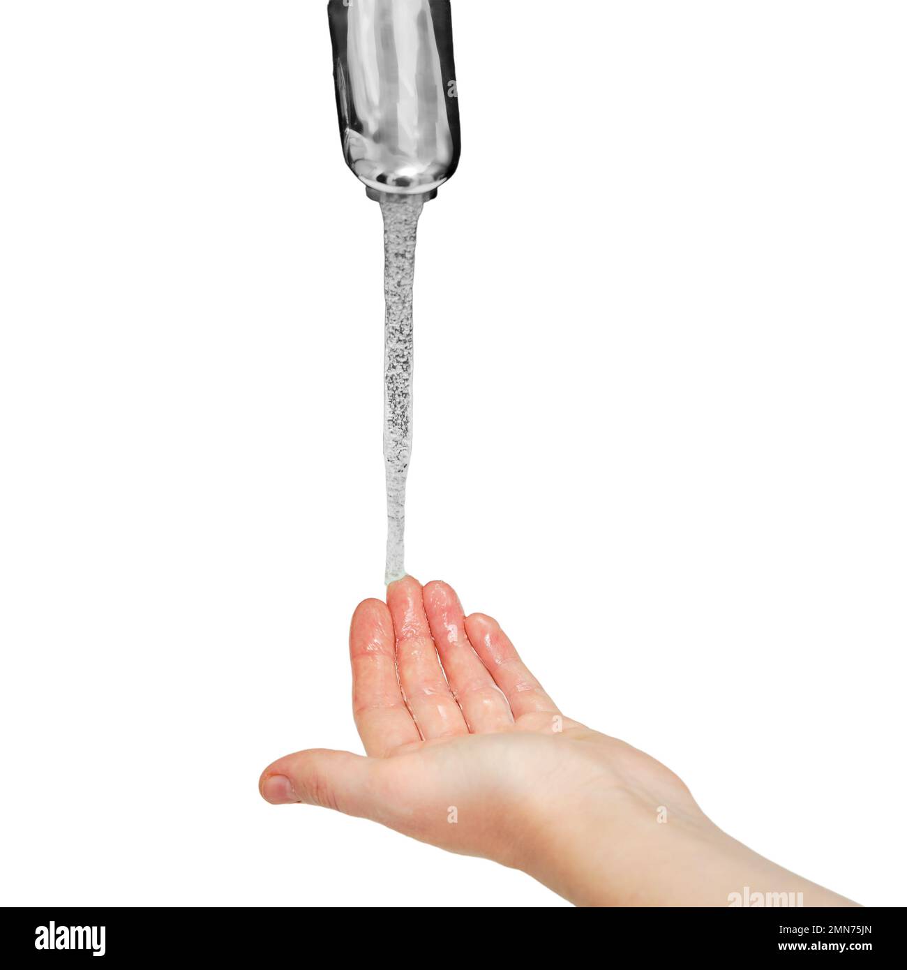 A woman checks the temperature of the tap water with her hand, isolated ...