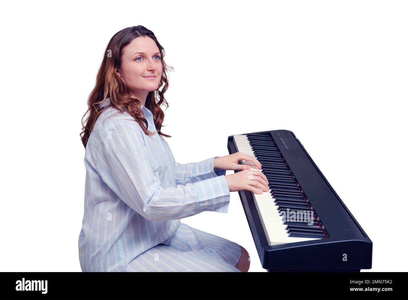 Portrait of an adult female musician in blue clothes, isolated on a ...