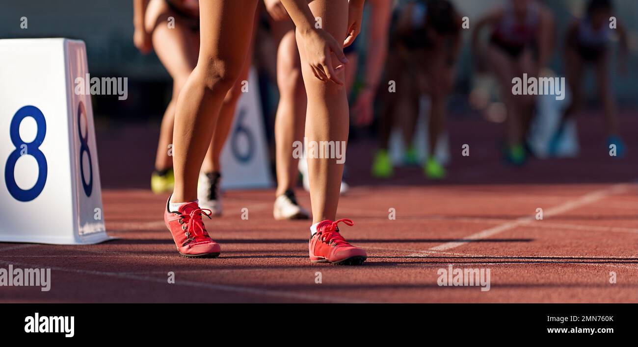 Female sprinter starting block hi-res stock photography and images - Alamy