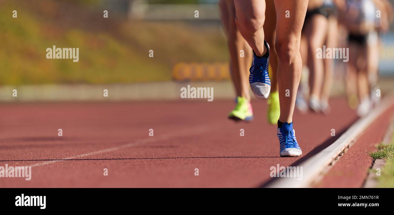 Group of athletes sprinters run speed on track of stadium Stock Photo ...