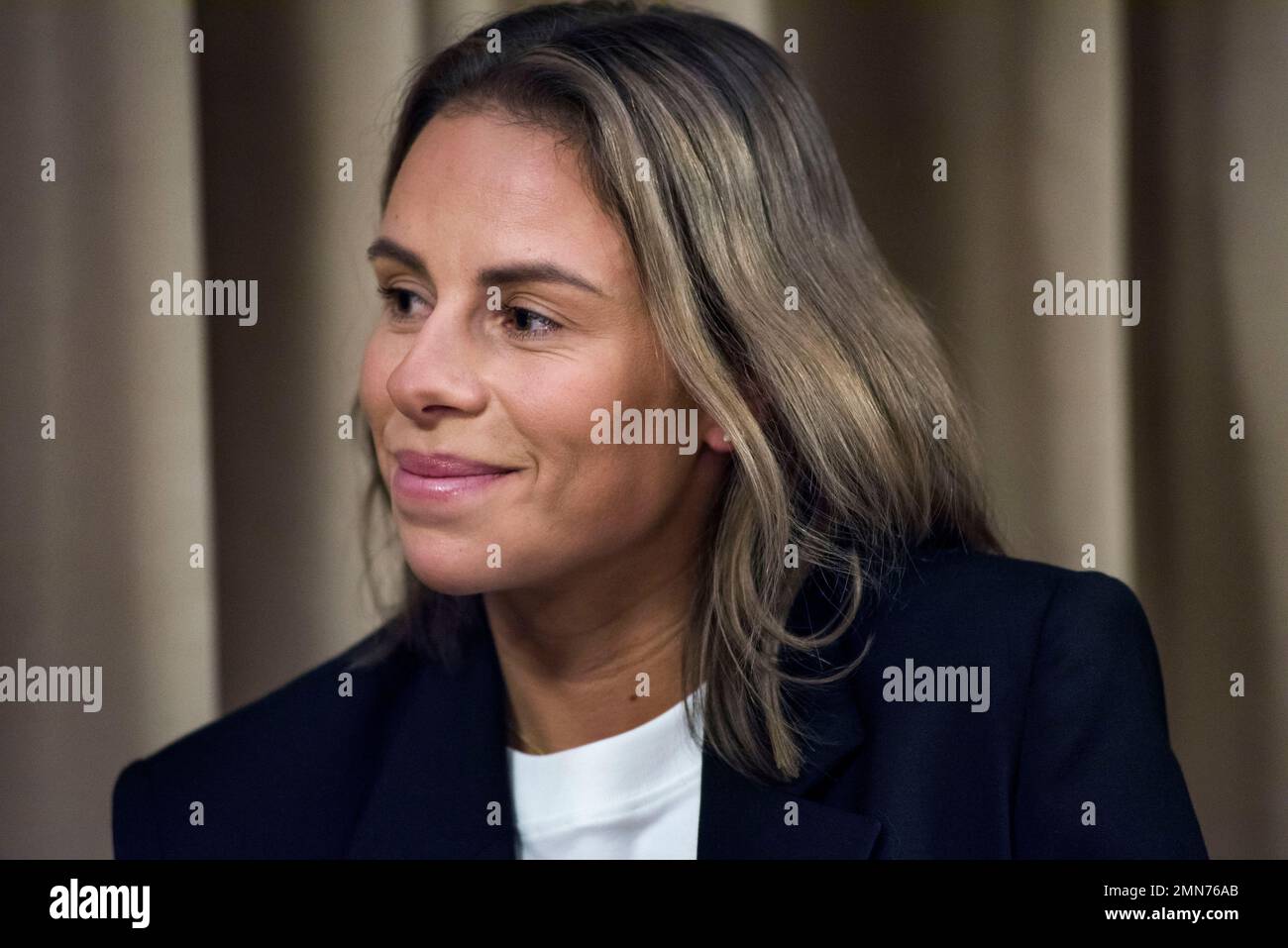 Magda Linette smiles during a press conference in Warsaw. Polish tennis ...