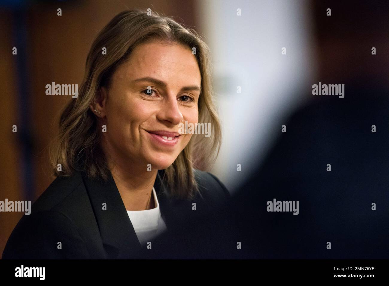 Magda Linette smiles during a press conference in Warsaw. Polish tennis ...