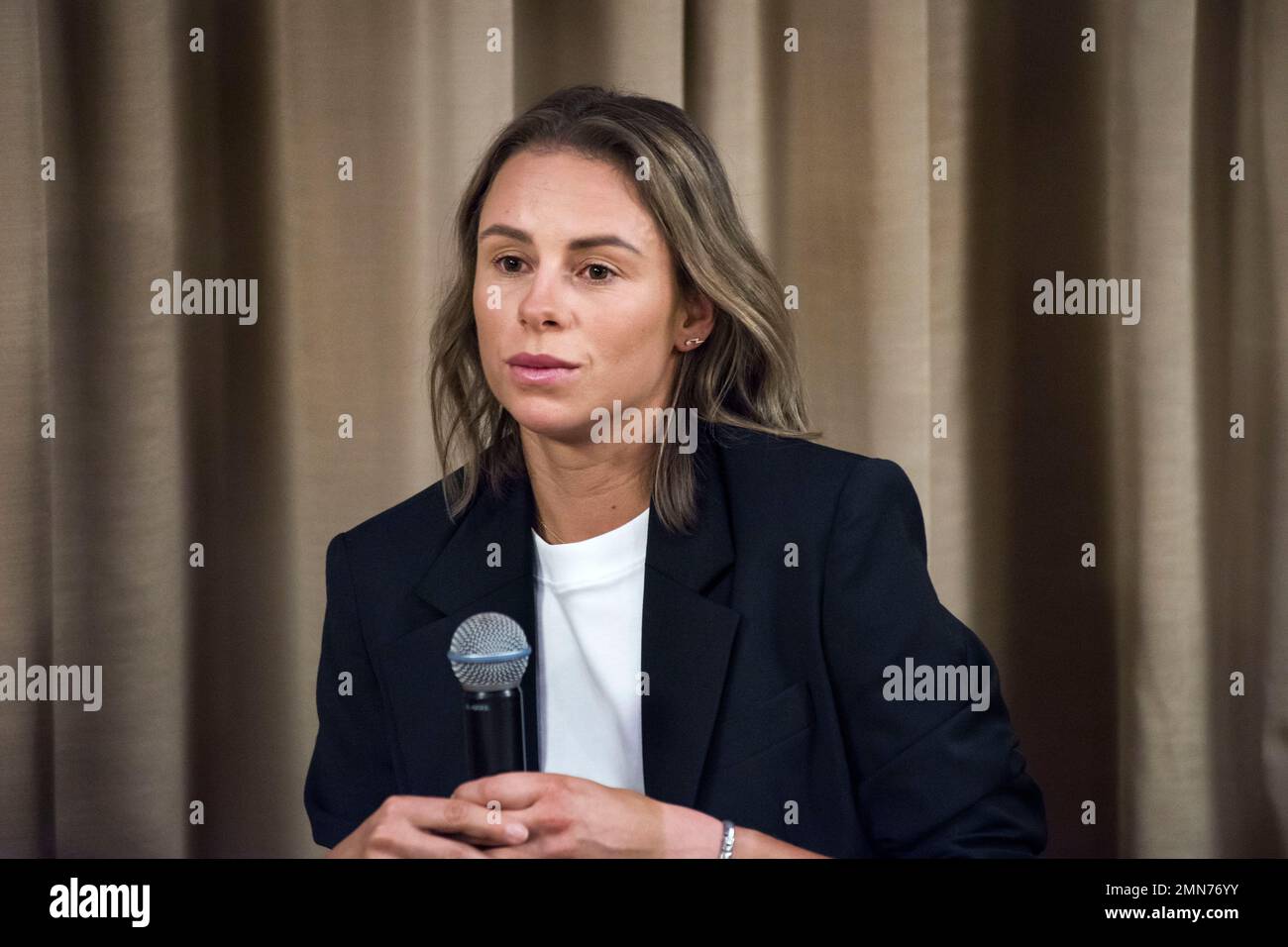 Magda Linette speaks during a press conference in Warsaw. Polish tennis ...