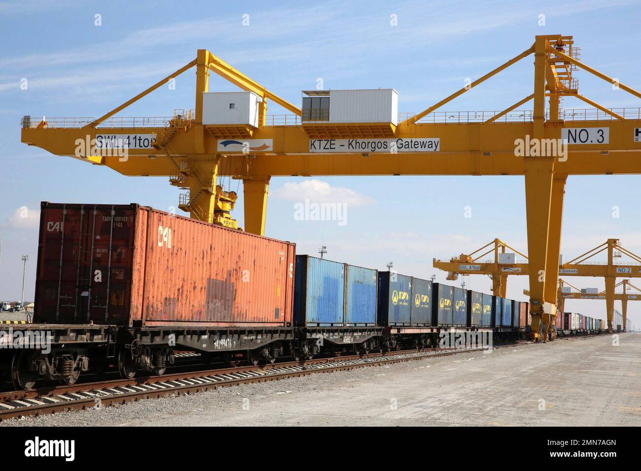 In this April 2, 2018, photo, containers are seen near cranes at the ...