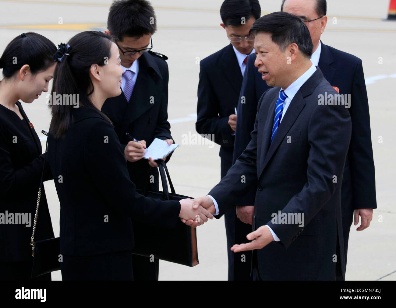 FILE - Song Tao, right, head of the Chinese Communist Party Central ...