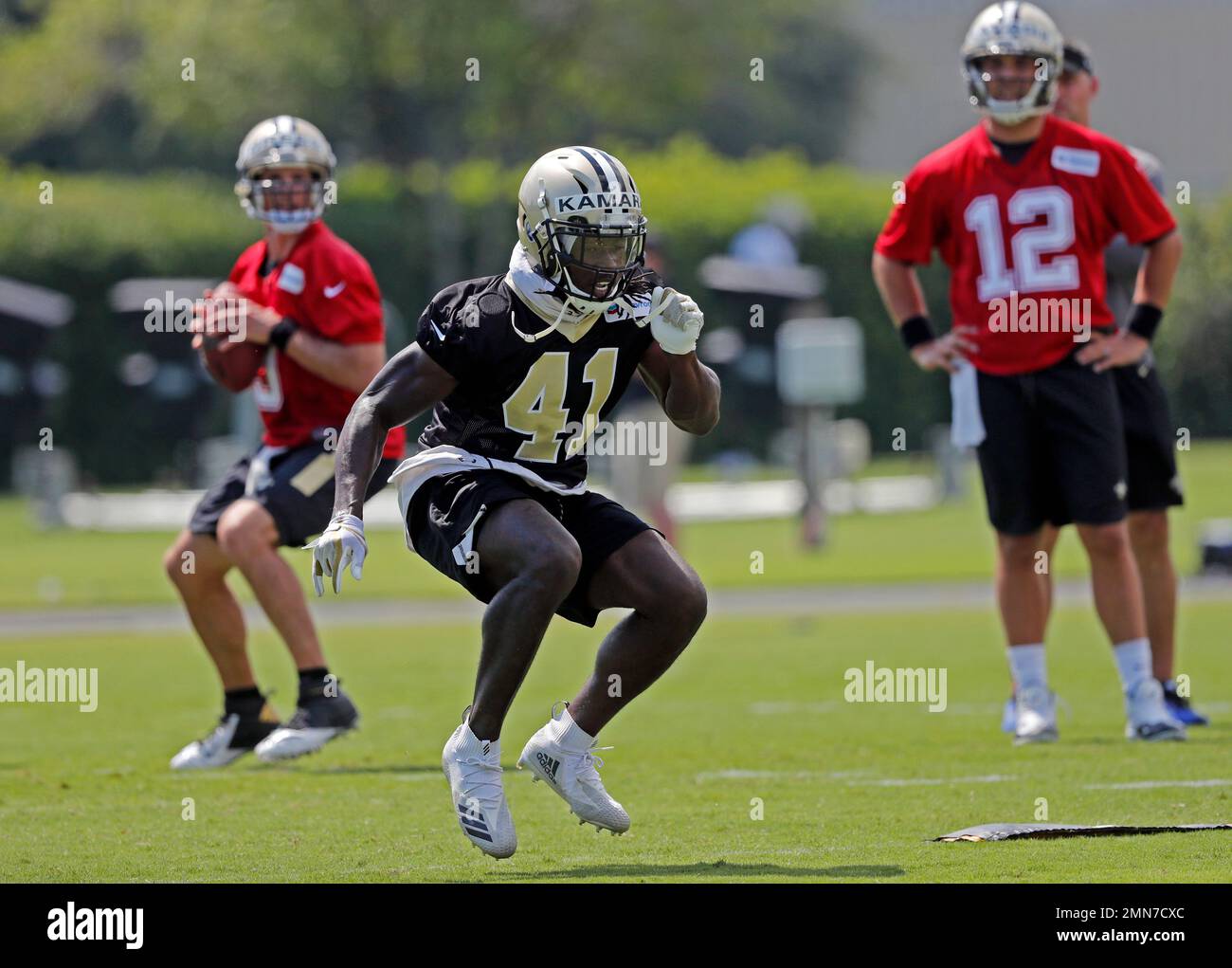 New Orleans Saints running back Alvin Kamara (14) runs trough drills ...