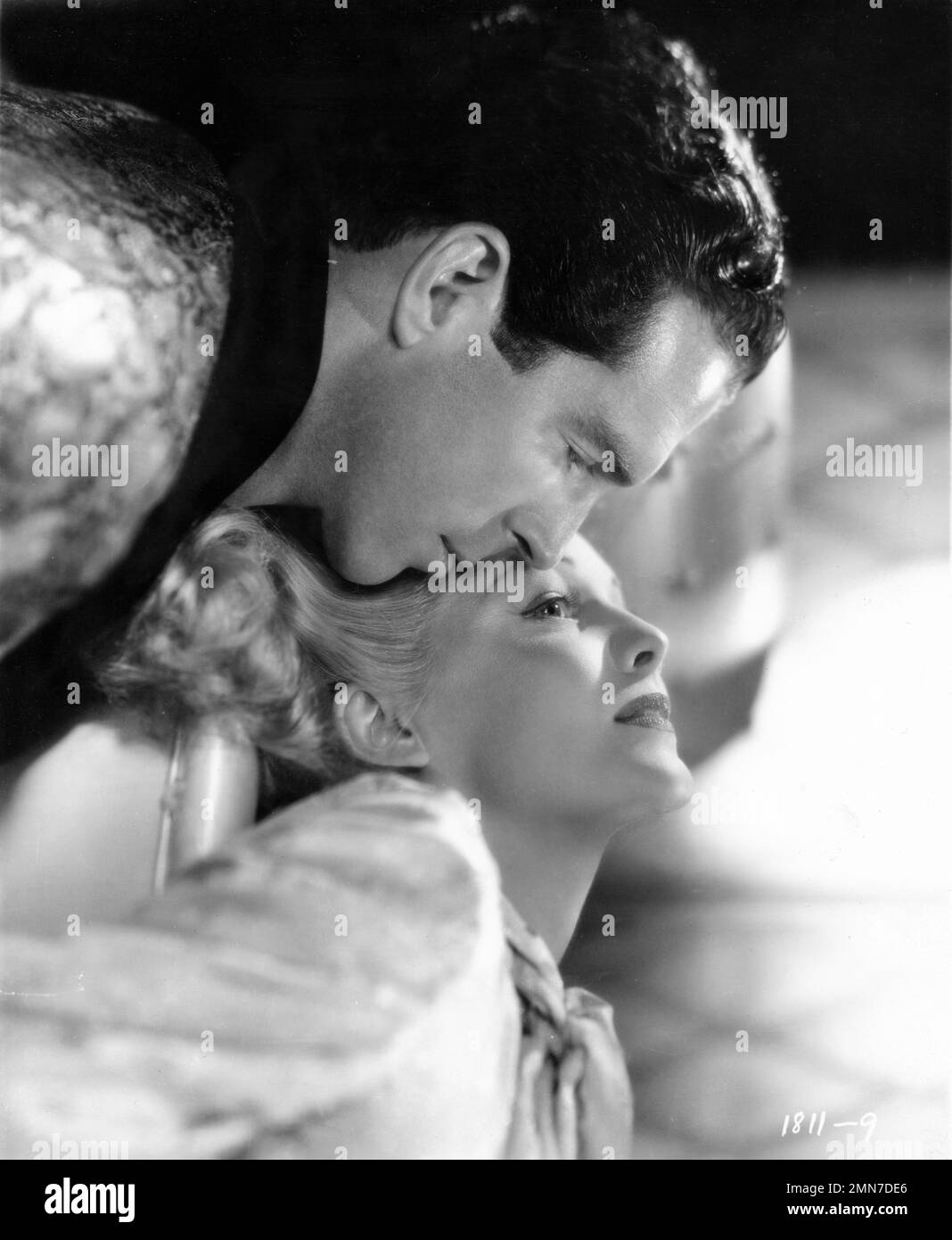 FRED MacMURRAY and MADELEINE CARROLL publicity portrait in HONEYMOON IN ...