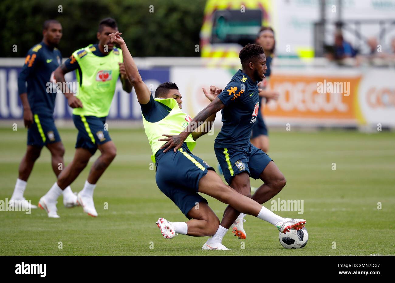 Brazil s Fred injures his right ankle from a tackle from Casemiro which led him to walk off the pitch and receive treatment and then watch from the sidelines during a national soccer