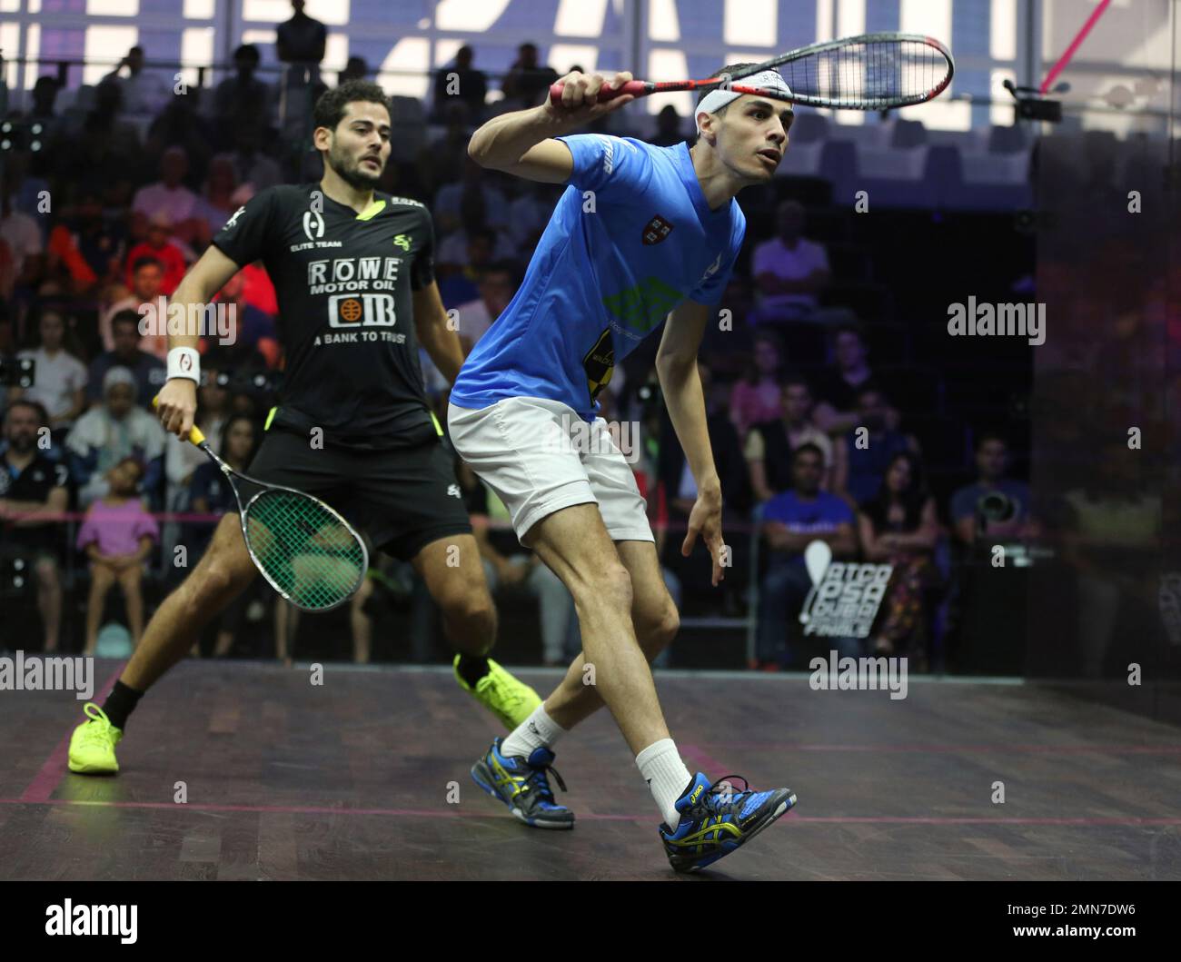 Ali Amr Farag of Egypt returns a shot from Karim Abdel Gawad of Egypt ...