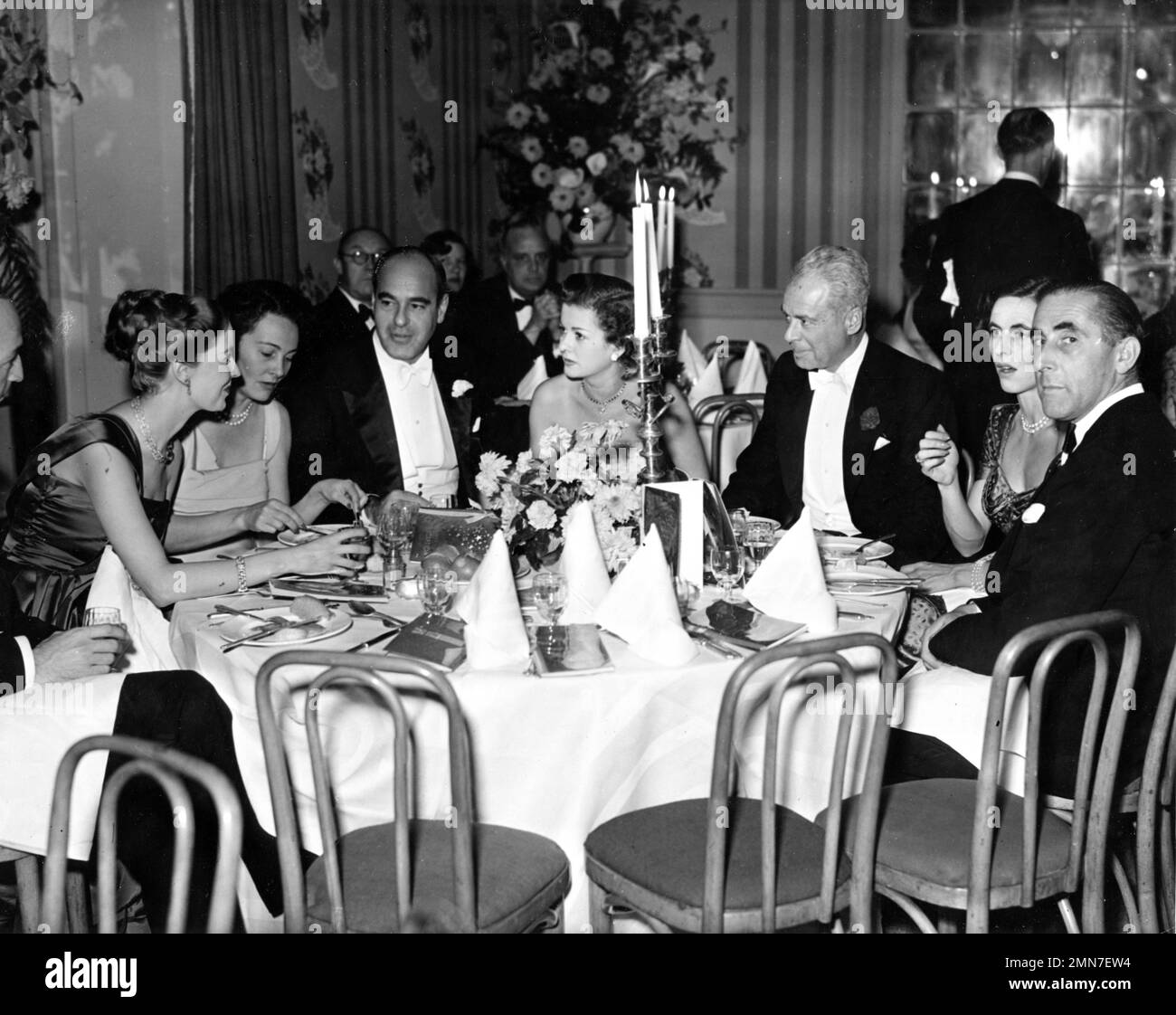 VALERIE HOBSON (far left) and JOAN BENNETT and her husband Producer ...
