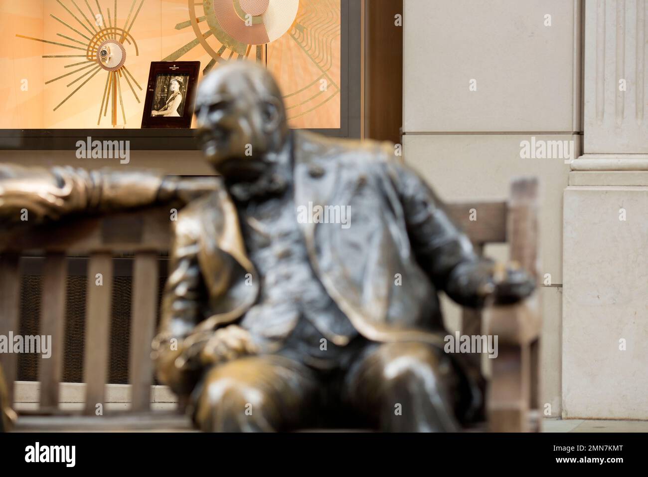 A portrait of Queen Elizabeth II is displayed in a shop window in ...