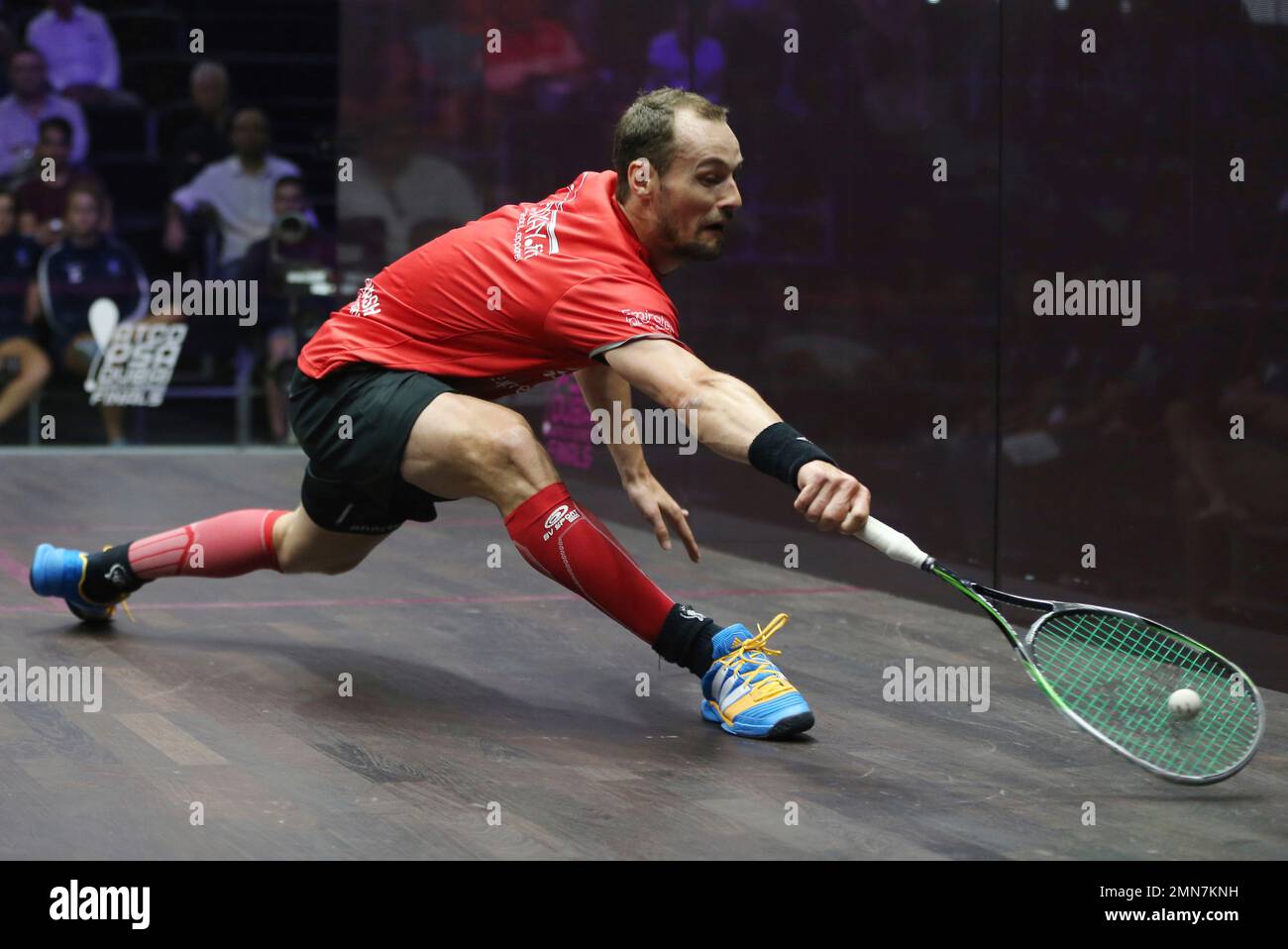 Grégory Gaultier of France returns a shot from Karim Abdel Gawad of ...