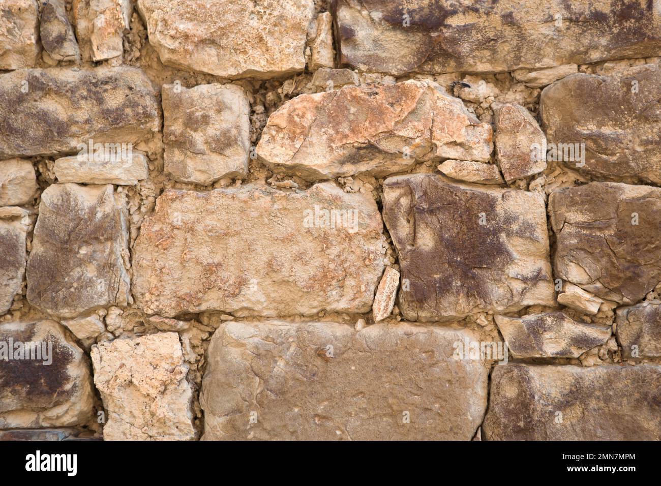 Masonry walls of natural sand color. Stone texture close-up ...
