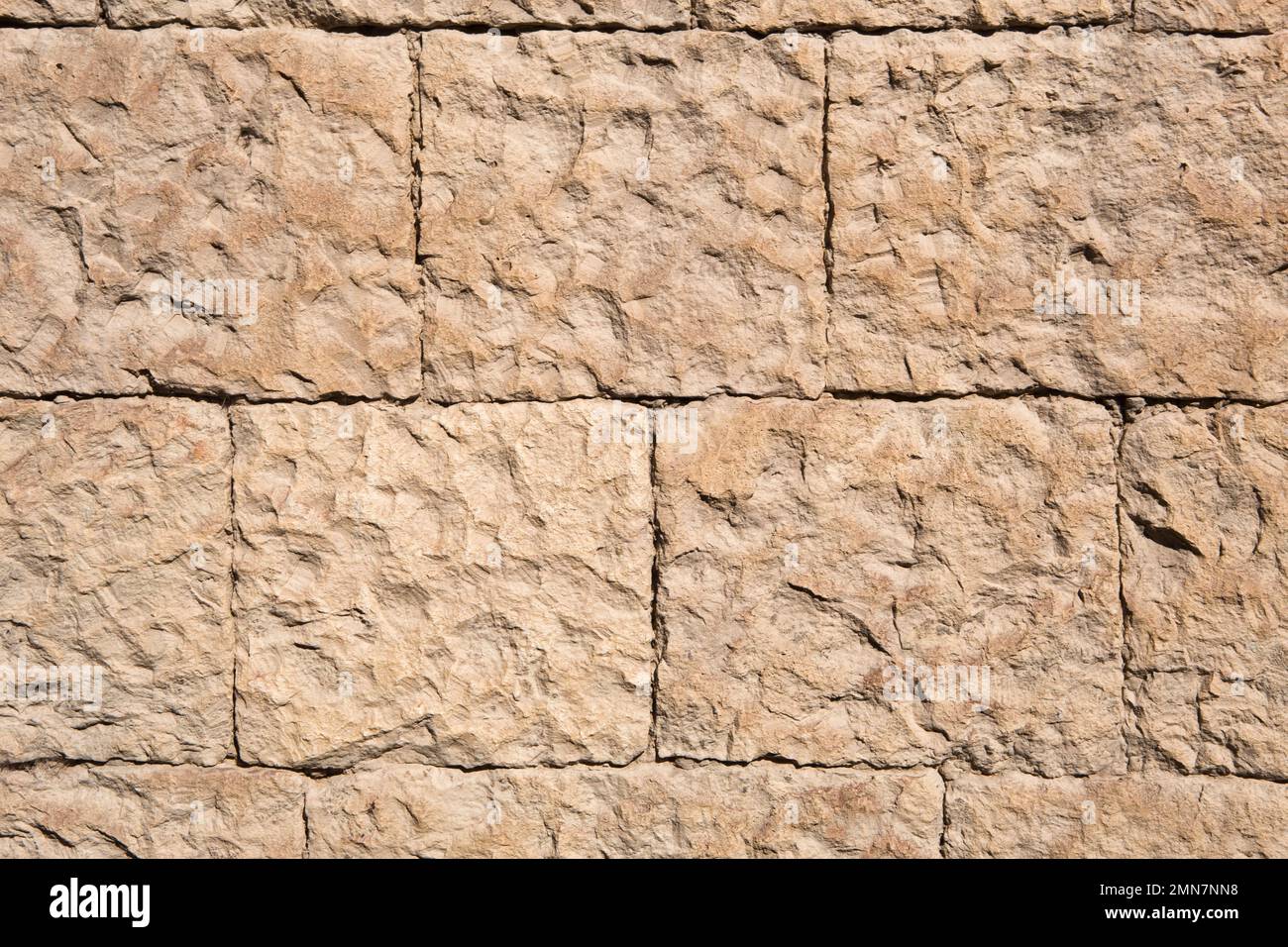 Masonry walls of natural sand color. Stone texture close-up ...
