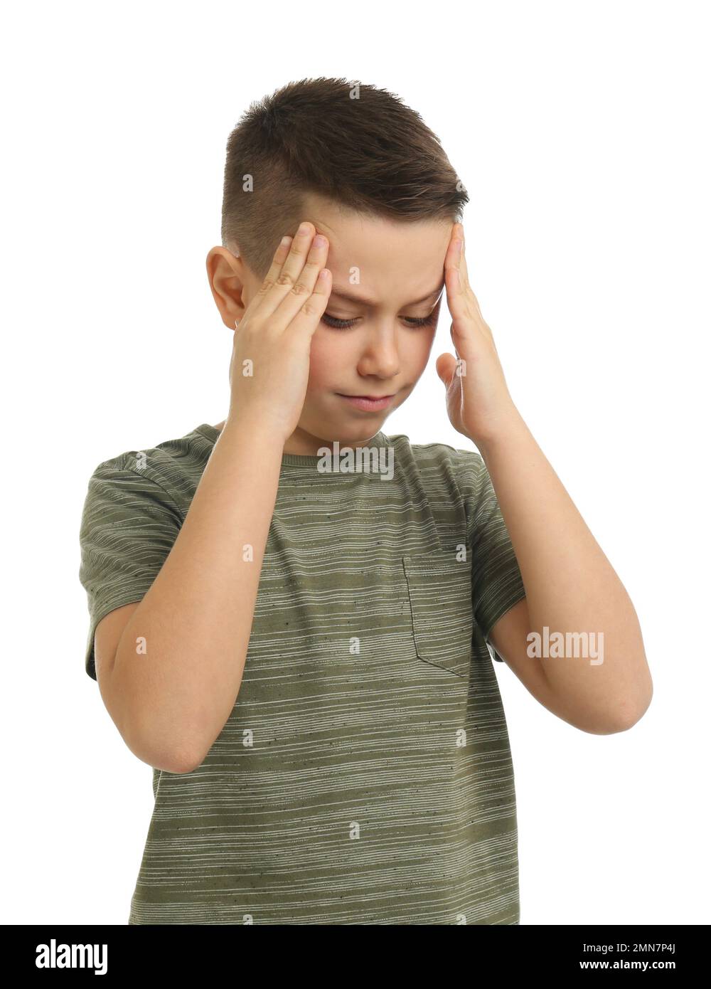 Portrait of preteen boy with headache on white background Stock Photo ...