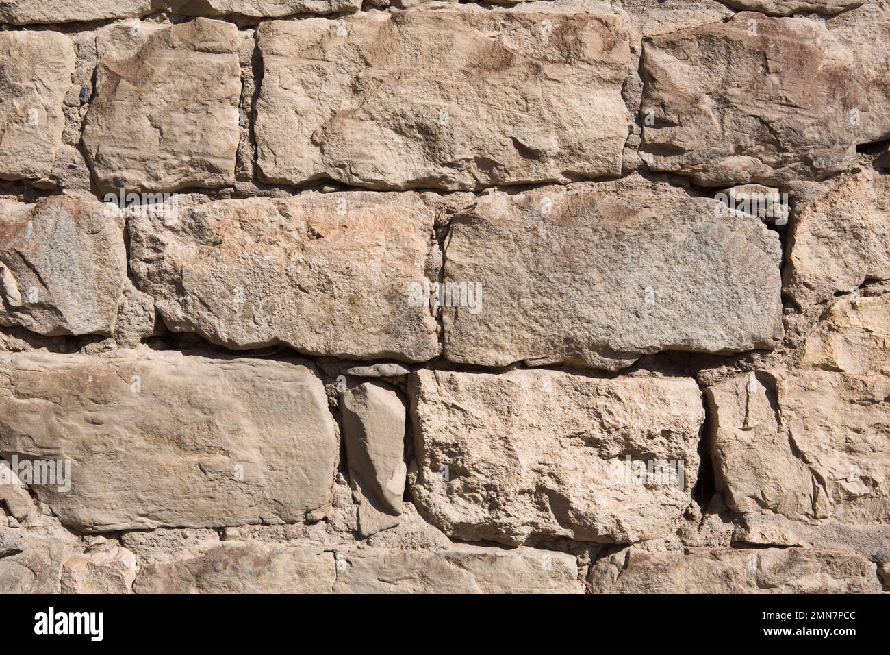 Masonry walls of natural sand color. Stone texture close-up ...